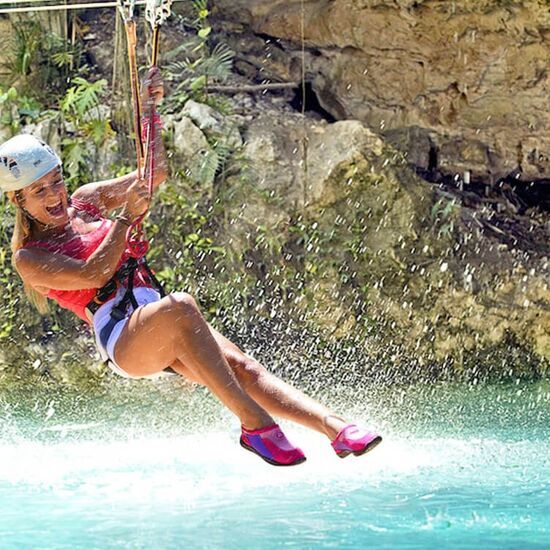 Book online: Canyoning & Zipline Polilimnio Waterfalls | Discover Greece